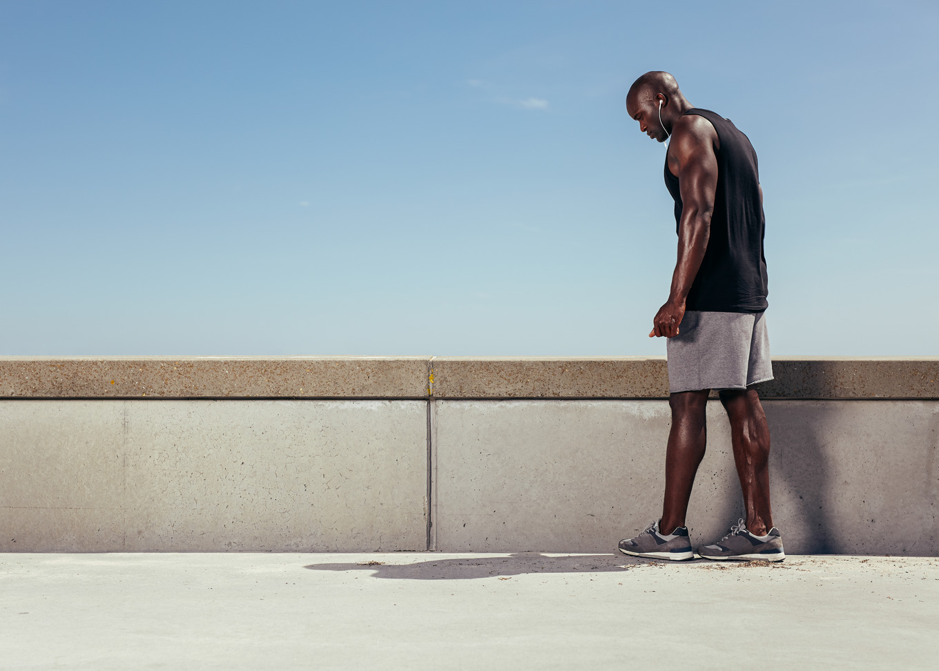 Muscular man on walkway, a Sports & Recreation Photo by Jacob Lund