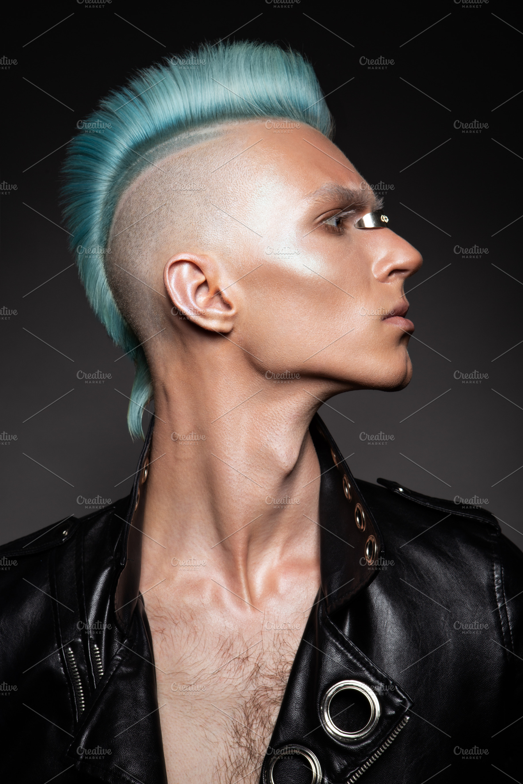 Profile of a handsome man with blue featuring hair, man, and blue, a ...