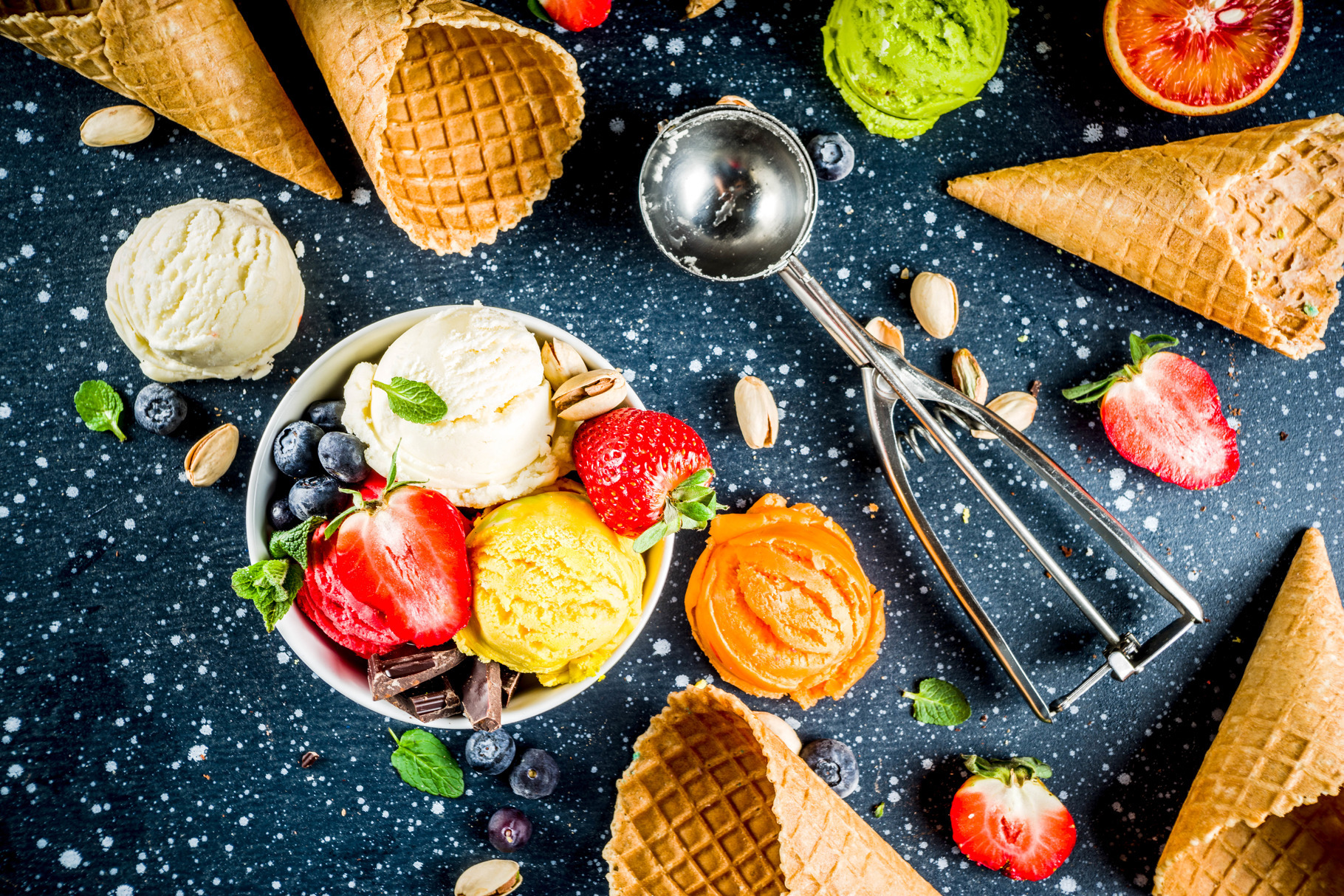 Colorful fruit and berry ice cream featuring mint, tropical, and sour ...