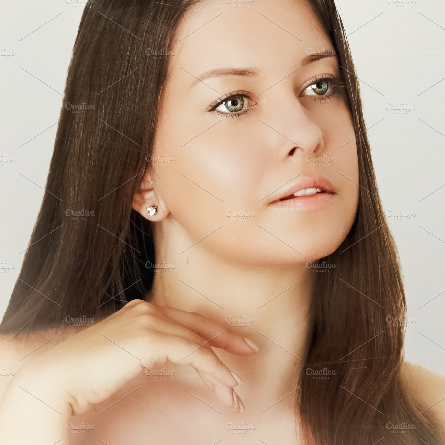 Suntan skin tone and beauty routine. Beautiful brunette female m, a ...