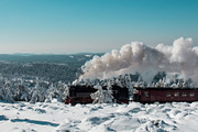 Steam locomotive in snowy landscape featuring winter, landscape, and ...