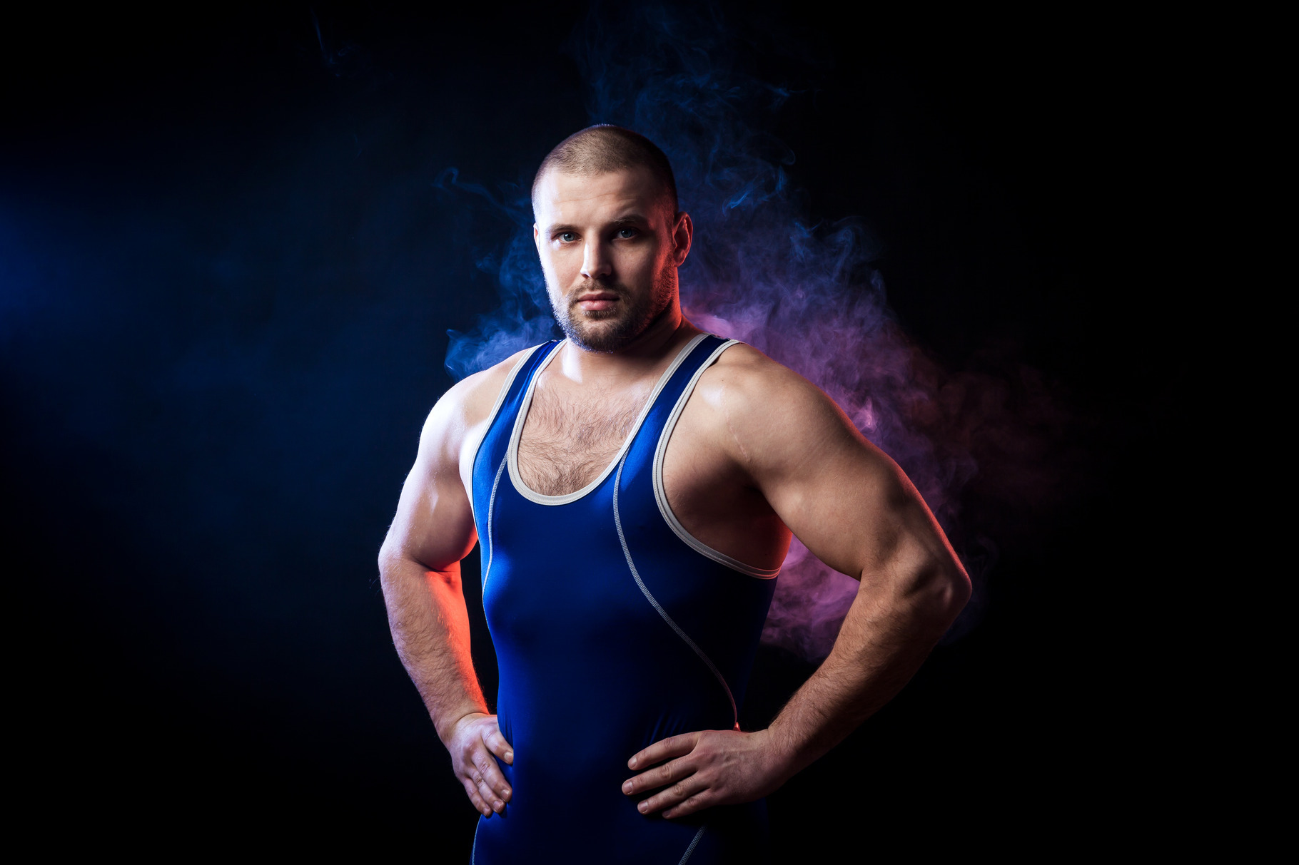 Wrestler posing on black isolated, a Sports & Recreation Photo by Sova