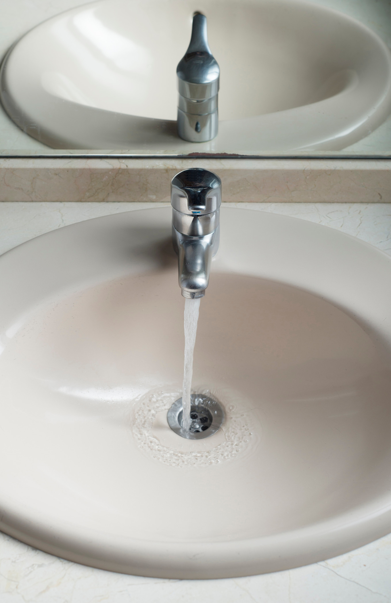 Working water tap in a bathroom featuring water, tap, and sink, an ...