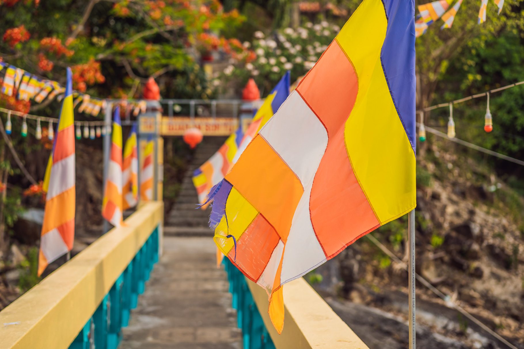 Buddhist flags at a temple in, a Nature Photo by Elizaveta Galitskaya