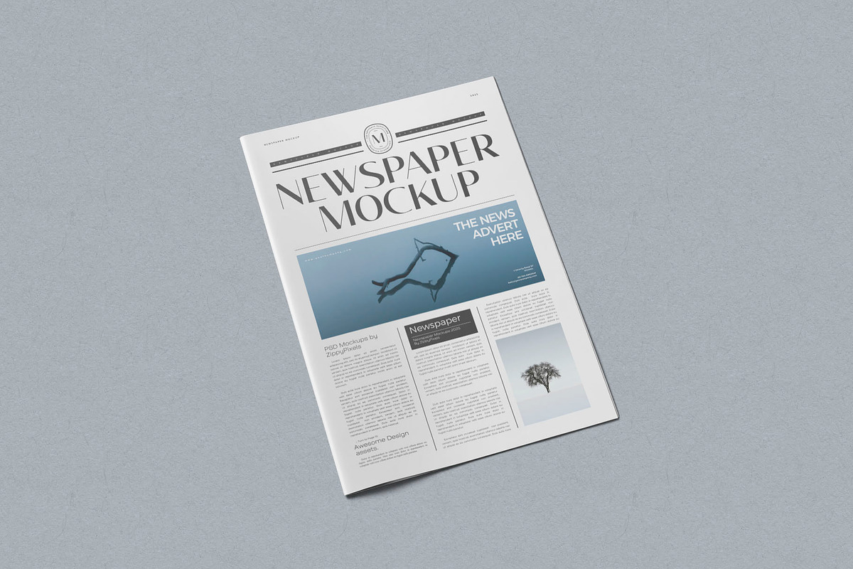 Tabloid Size Newspaper Mockup, a Product Mockup by PixelVoyager