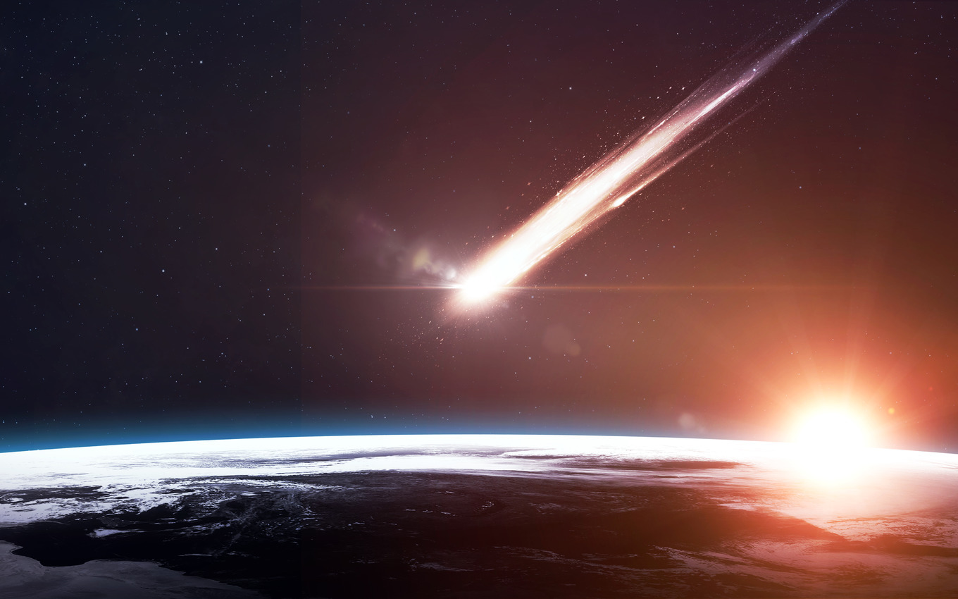 A meteor glowing as it enters the earth's atmosphere elements of this ...
