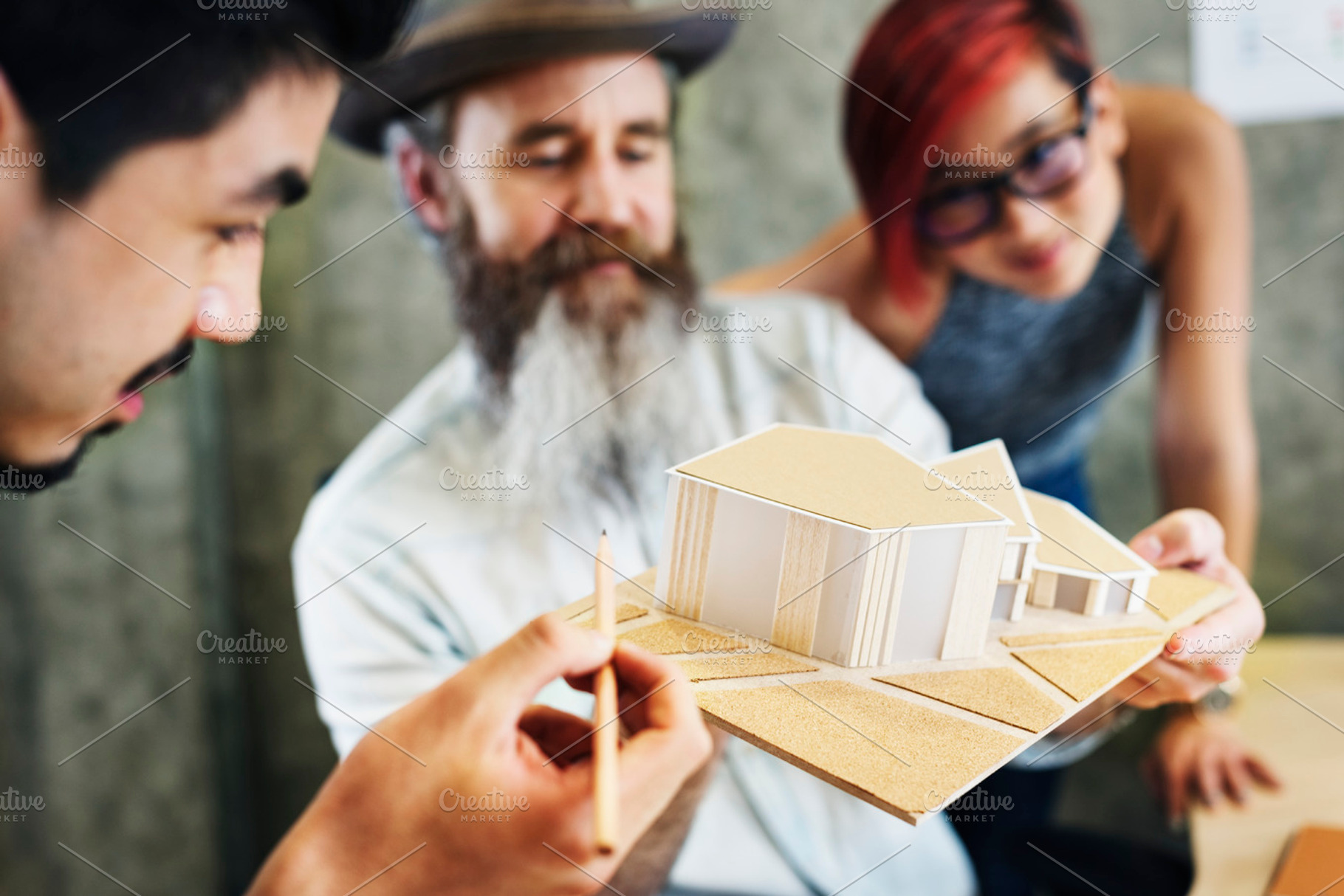 Working on house model featuring architect, architectural model, and, a ...