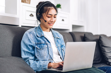 Woman talk speak using laptop computer working and video confere, a ...