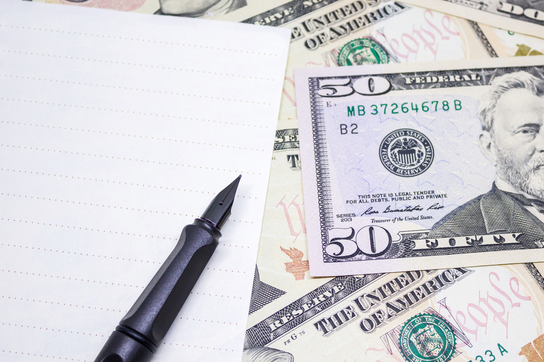 Fountain pen paper with banknotes featuring money, dollar, and business ...