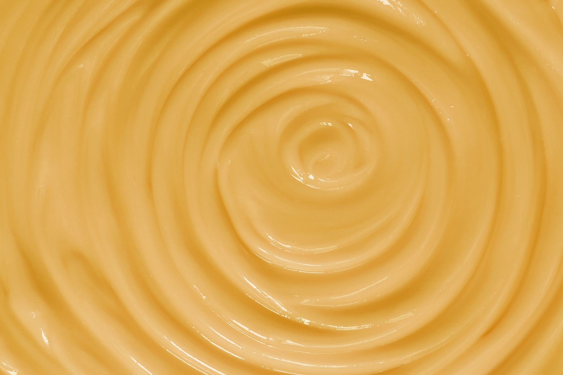 Mustard yellow swirl cream texture, a Beauty & Fashion Photo by Yulia71