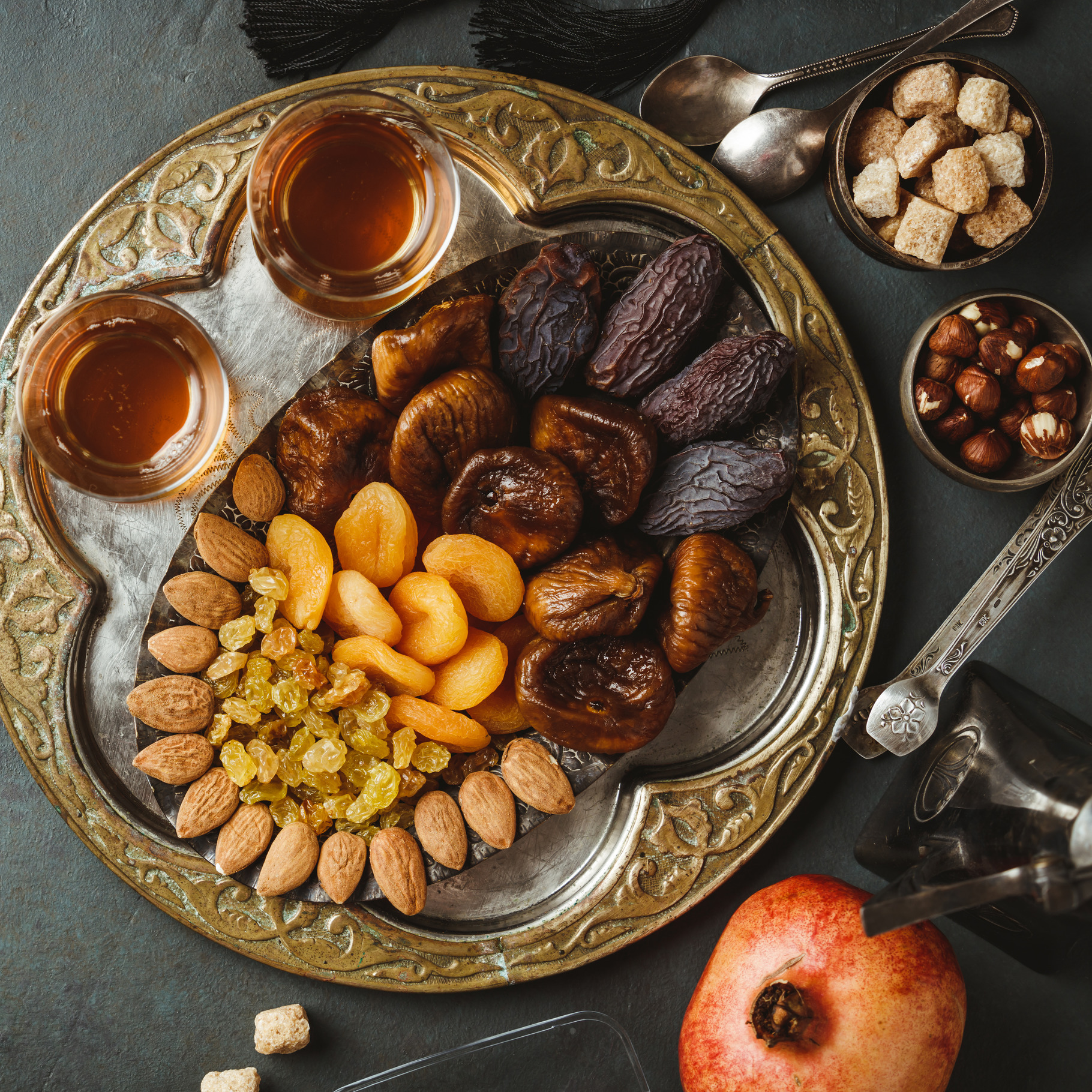 Traditional arabic tea and dry fruit featuring apricot, arabian, and ...
