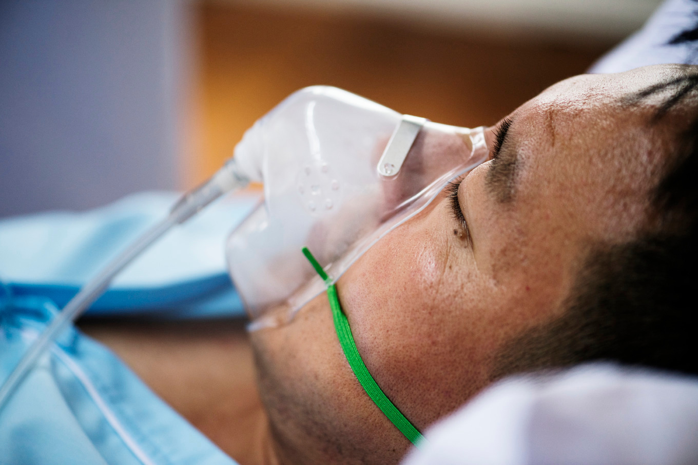 A sick asian man in a hospital featuring asian, coma, and healthcare, a ...