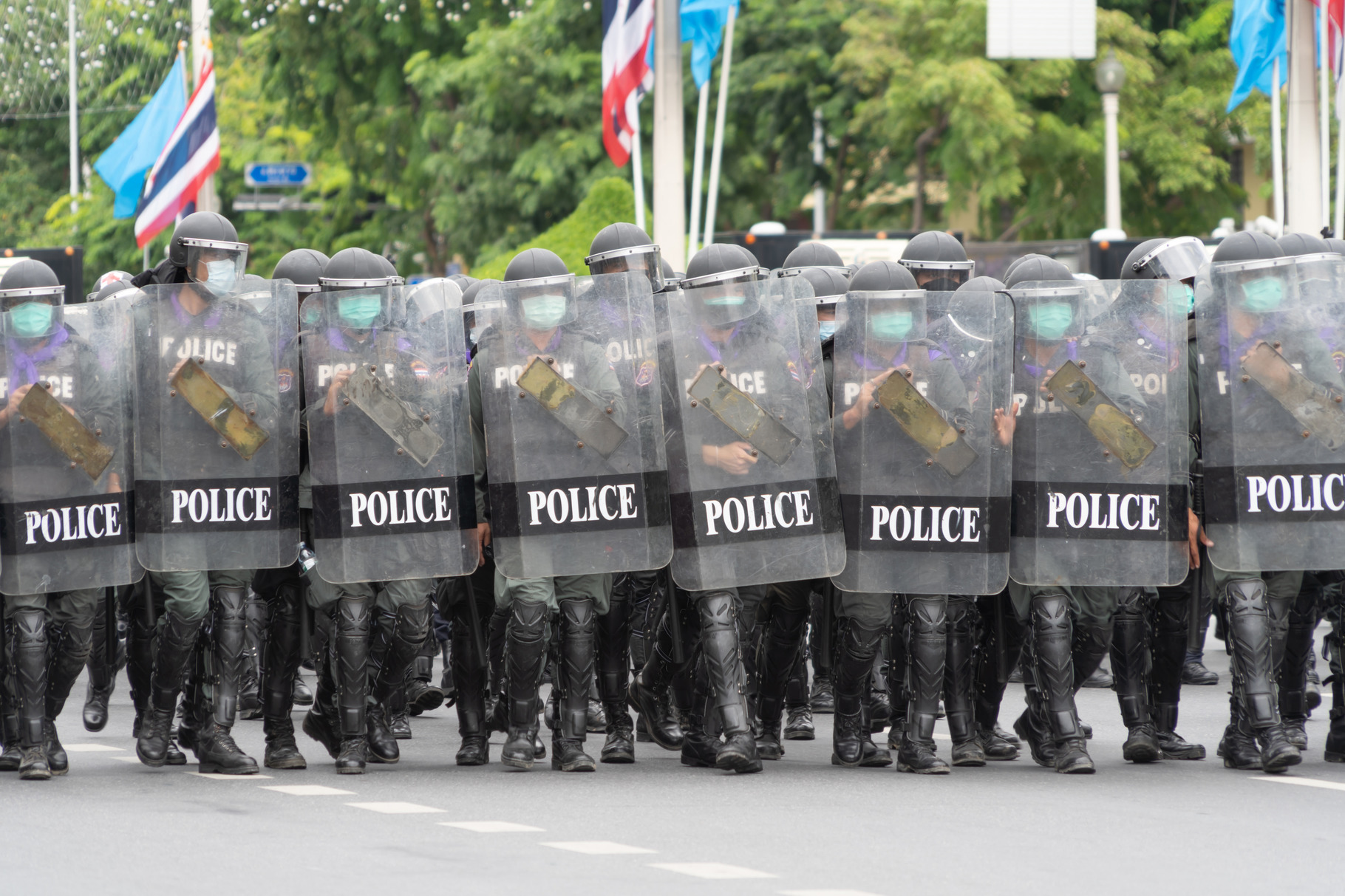Police officer team with weapons and riot shield protection. Vio, a ...