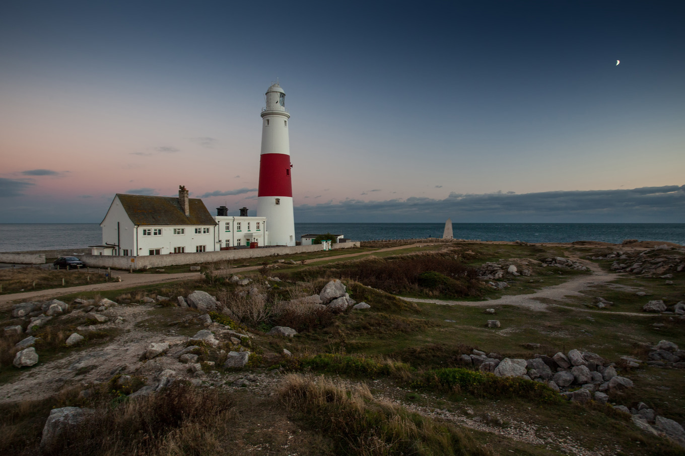 Lighthouse at sunset containing lighthouse, coast, and sunset, a Nature ...