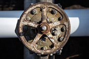 Top view on old handwheel of valve featuring handwheel, valve, and hand ...