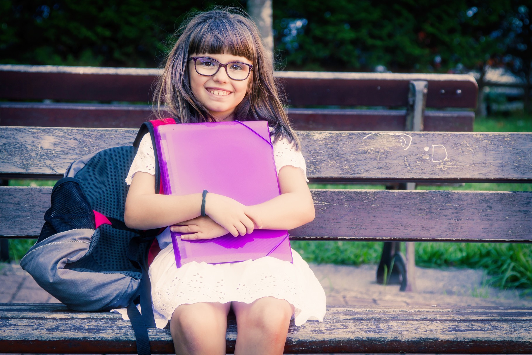Portrait of student with notebook an containing students, college, and ...