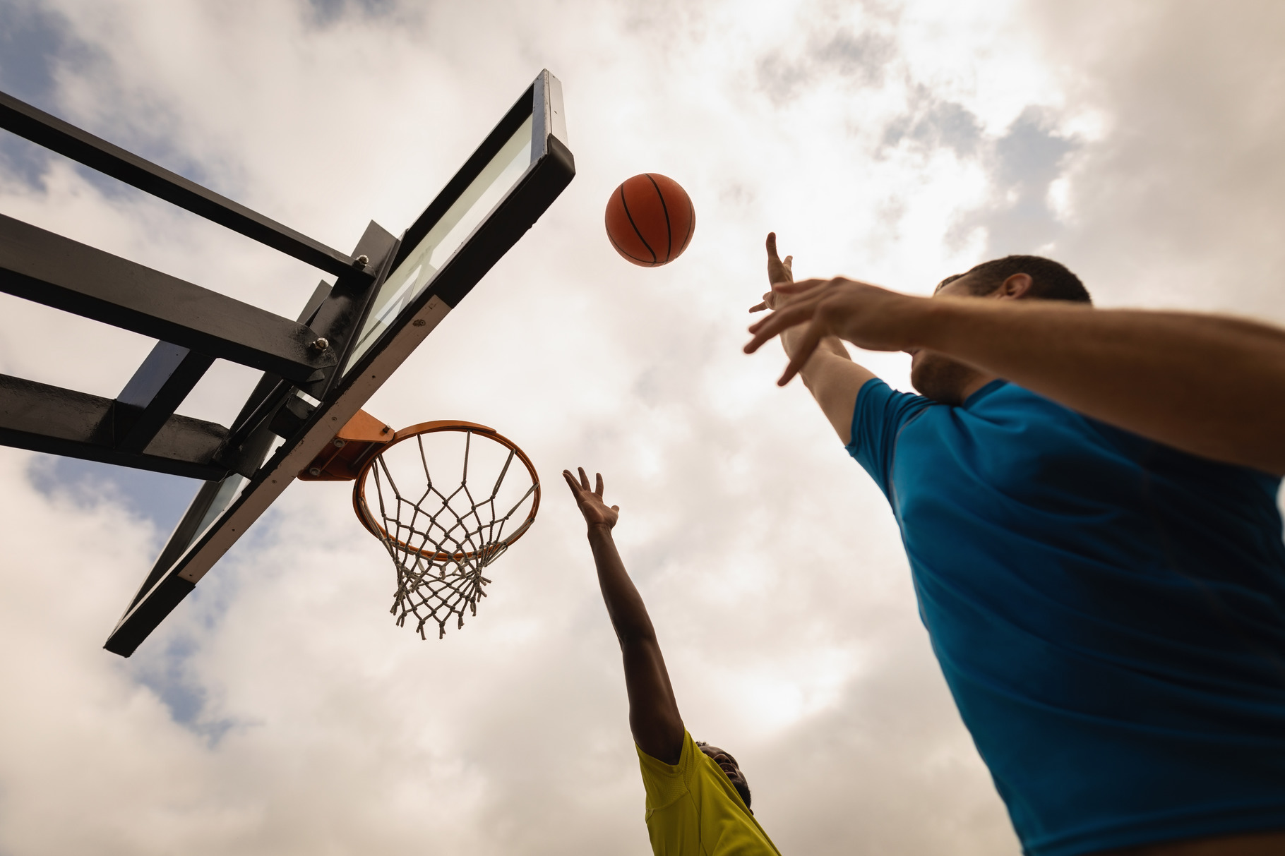 Players playing basketball at basket | Stock Photos ~ Creative Market