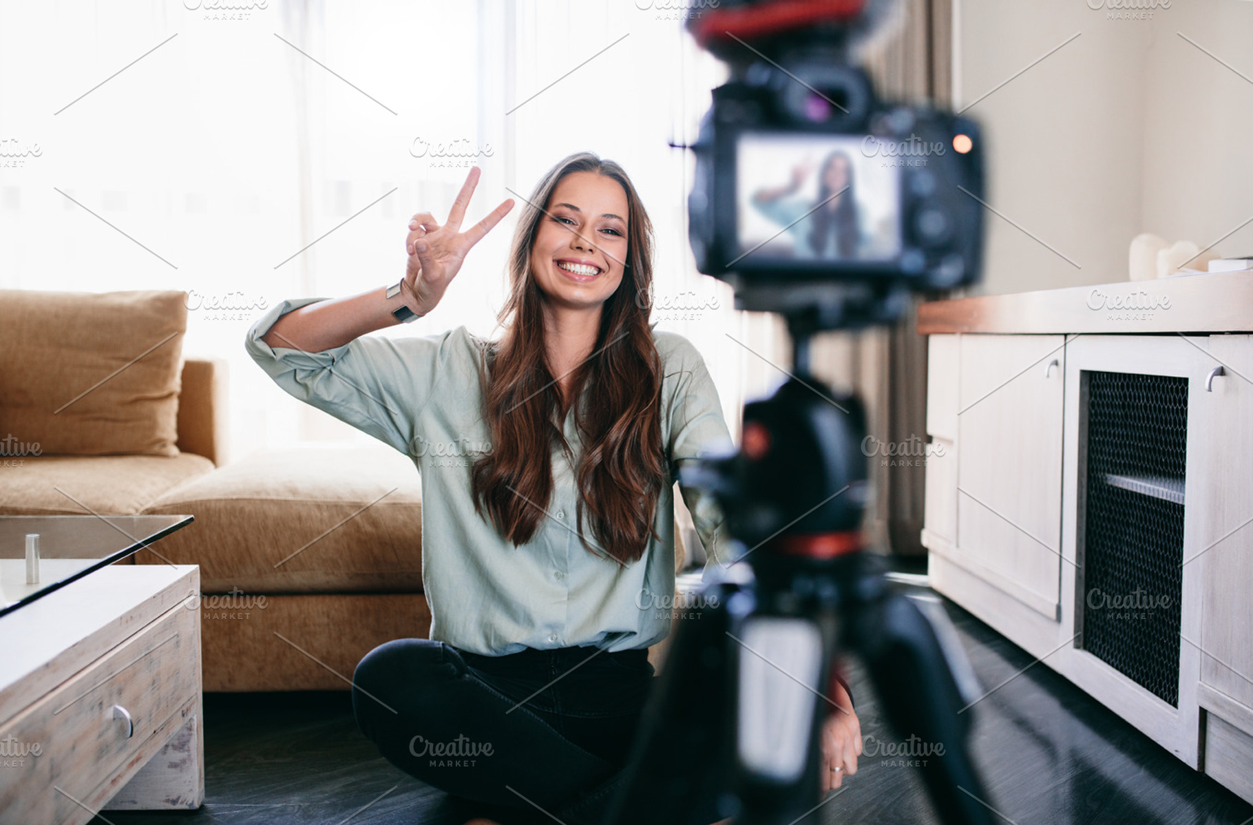Young woman recording content featuring blog, blogger, and camera, a ...