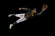 Flying. Baseball player, catcher in sports uniform and equipment ...