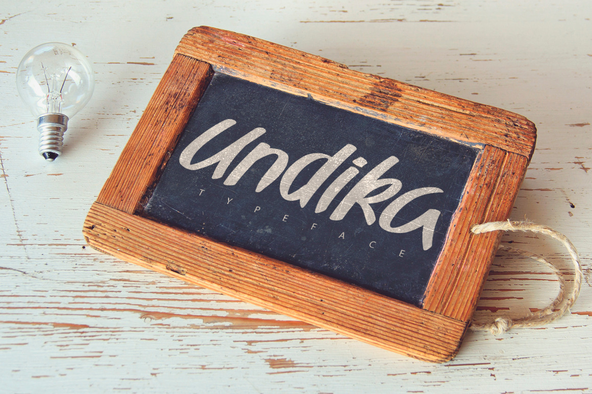Undika Typeface, a Script Font by SmartDesigns