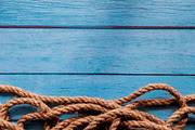 Rope on blue wooden background | Beauty & Fashion Stock Photos ...