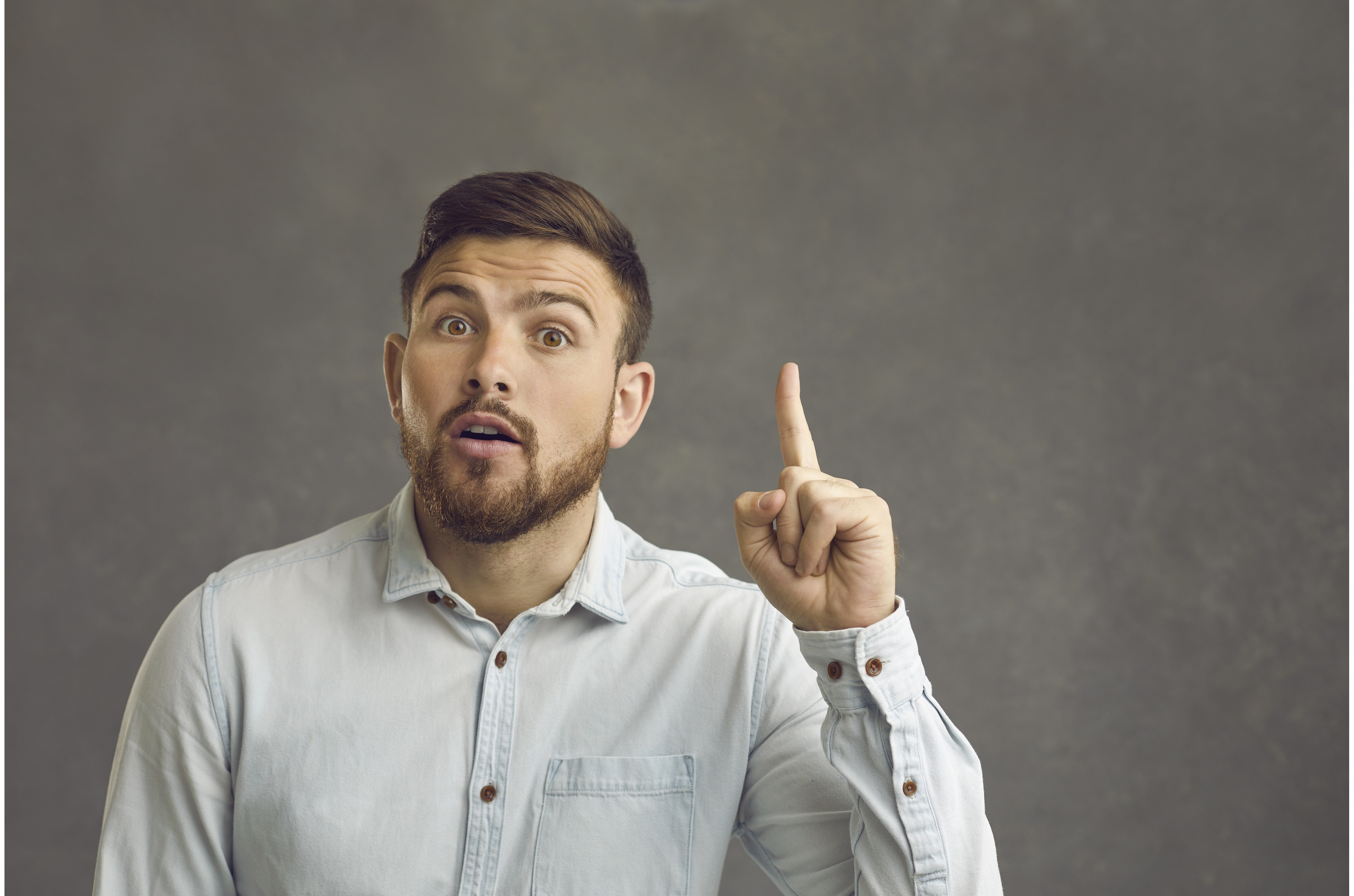 Man raises his index finger up as a, a Business Photo by StudioRomantic ...