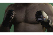 MMA fighter on a green screen, a Background Graphic by Media Whale Stock