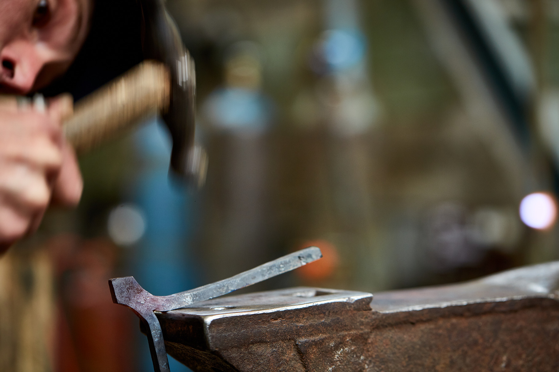 Closeup of a blacksmith's hands featuring anvil, blacksmith, and craft ...