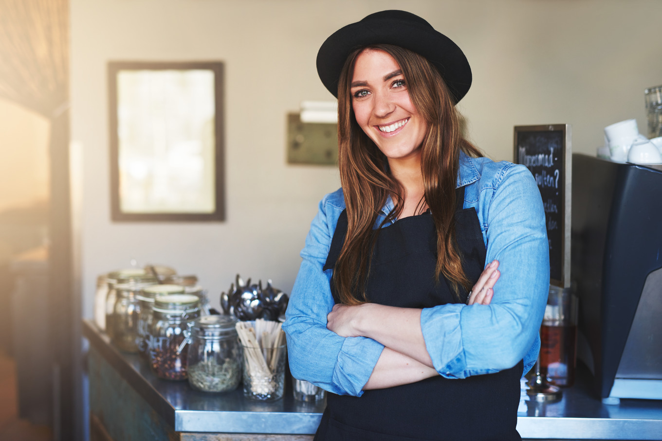 Young female smiling staff posing in cafe, a Business Photo by Stefan ...