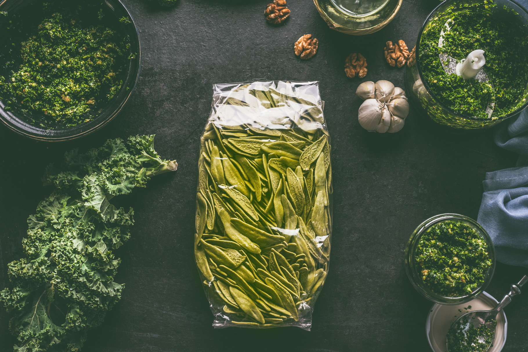 Green pasta in plastic packing, a Food & Drink Photo by VICUSCHKA