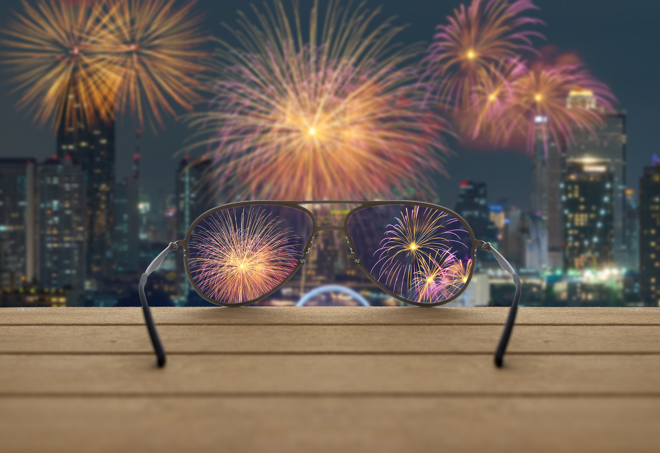 Fireworks focused in glasses lenses, a Holiday Photo by Tzido Gallery