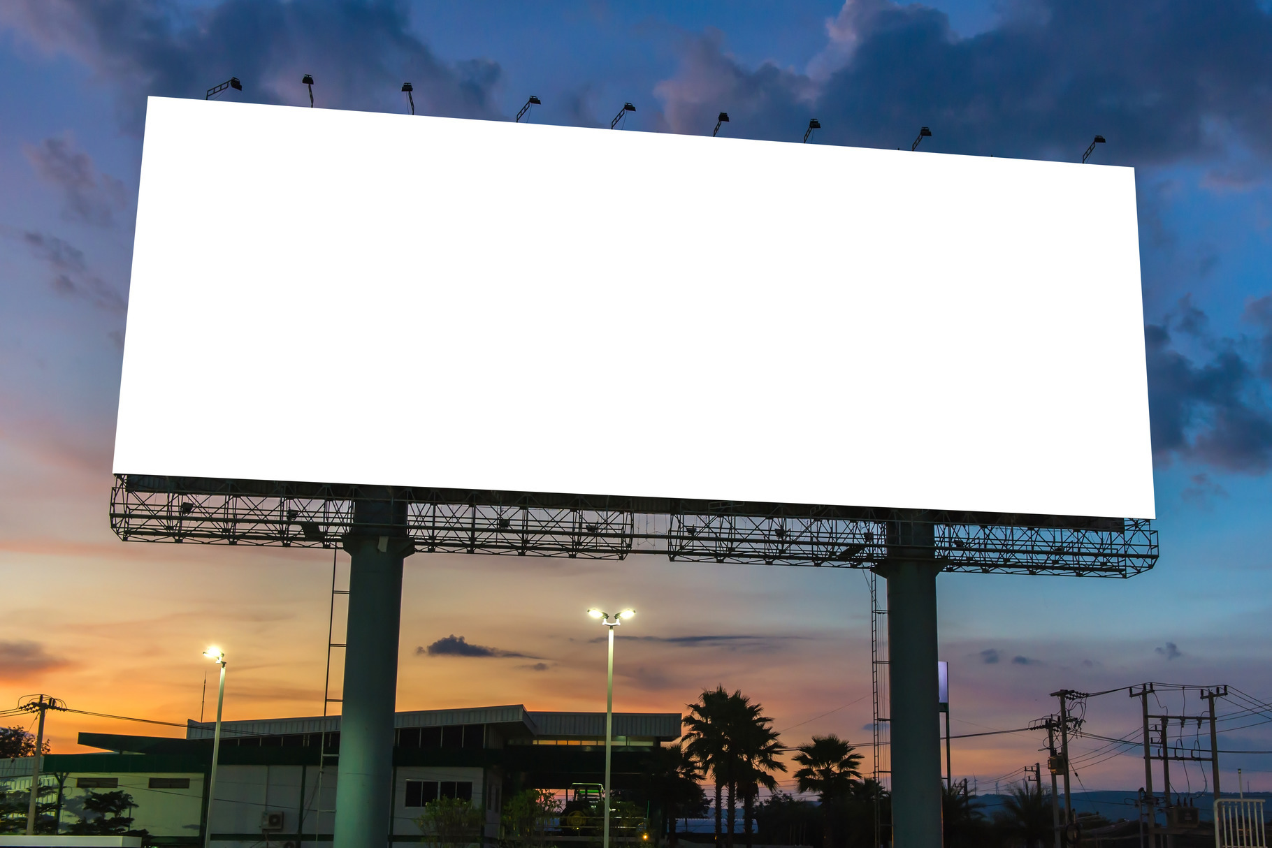 Billboard or advertising poster featuring billboard, night, and ...