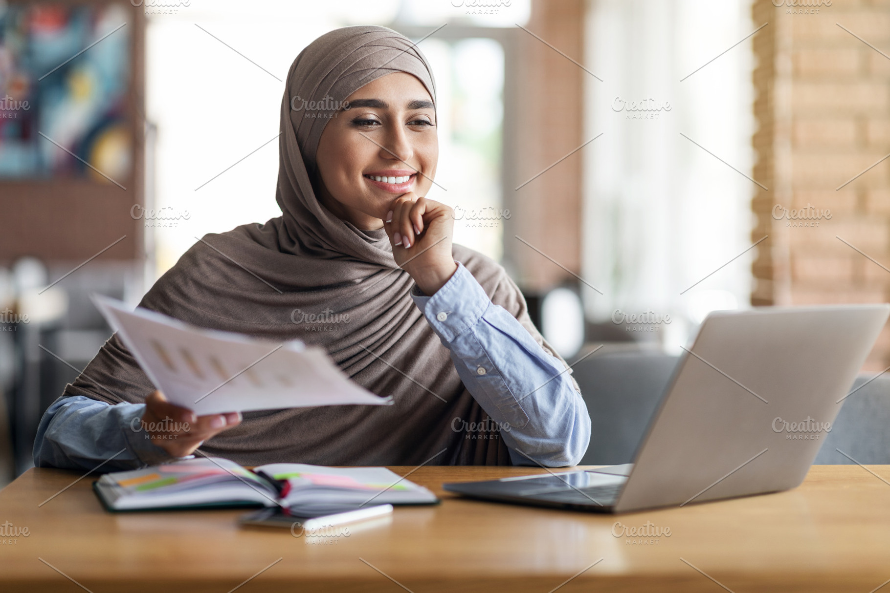 Successfull muslim woman manager wor, a Photo by Prostock-Studio ...