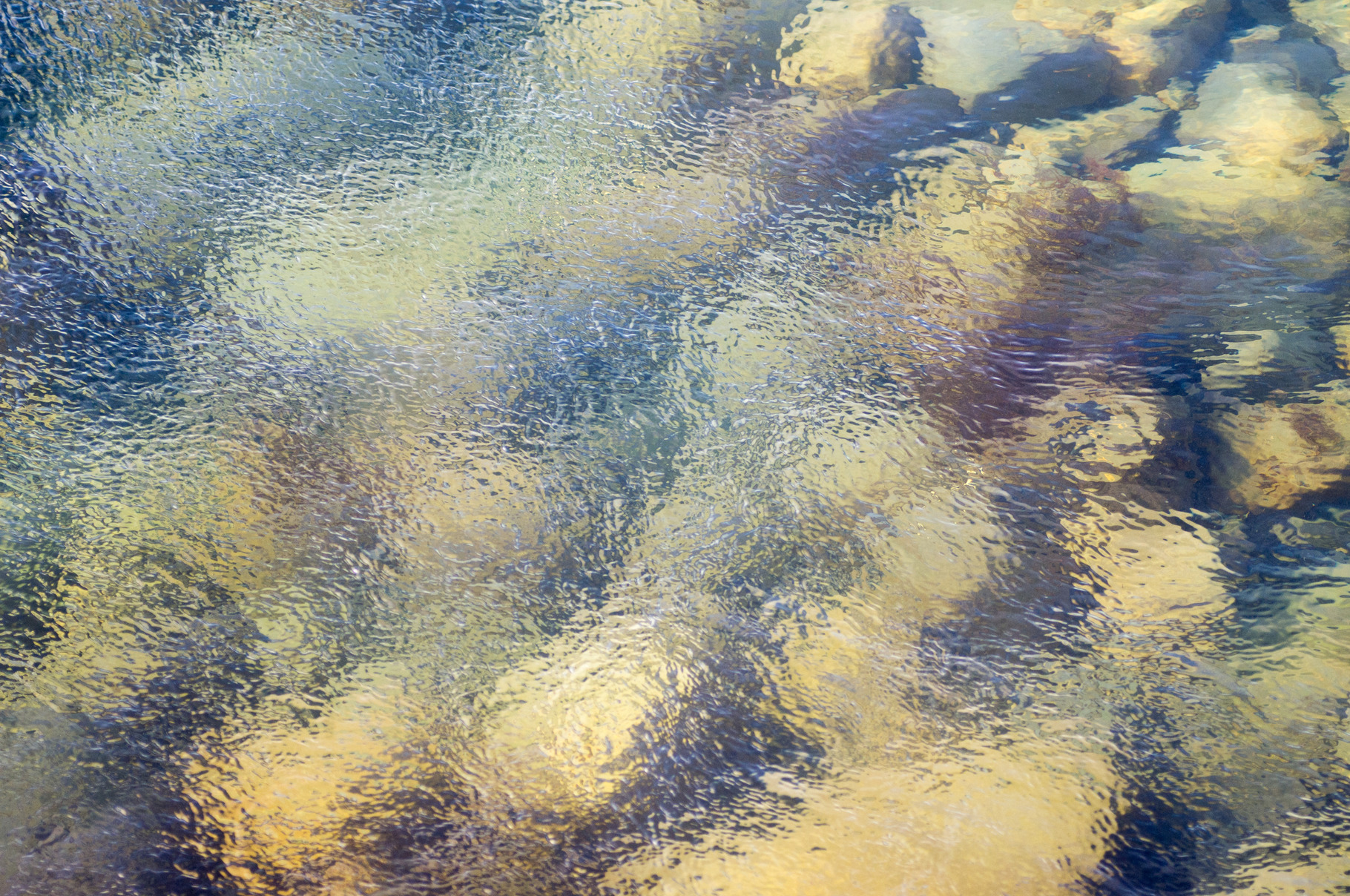 The wind raised ripples on the water top view, a Nature Photo by Photosiber