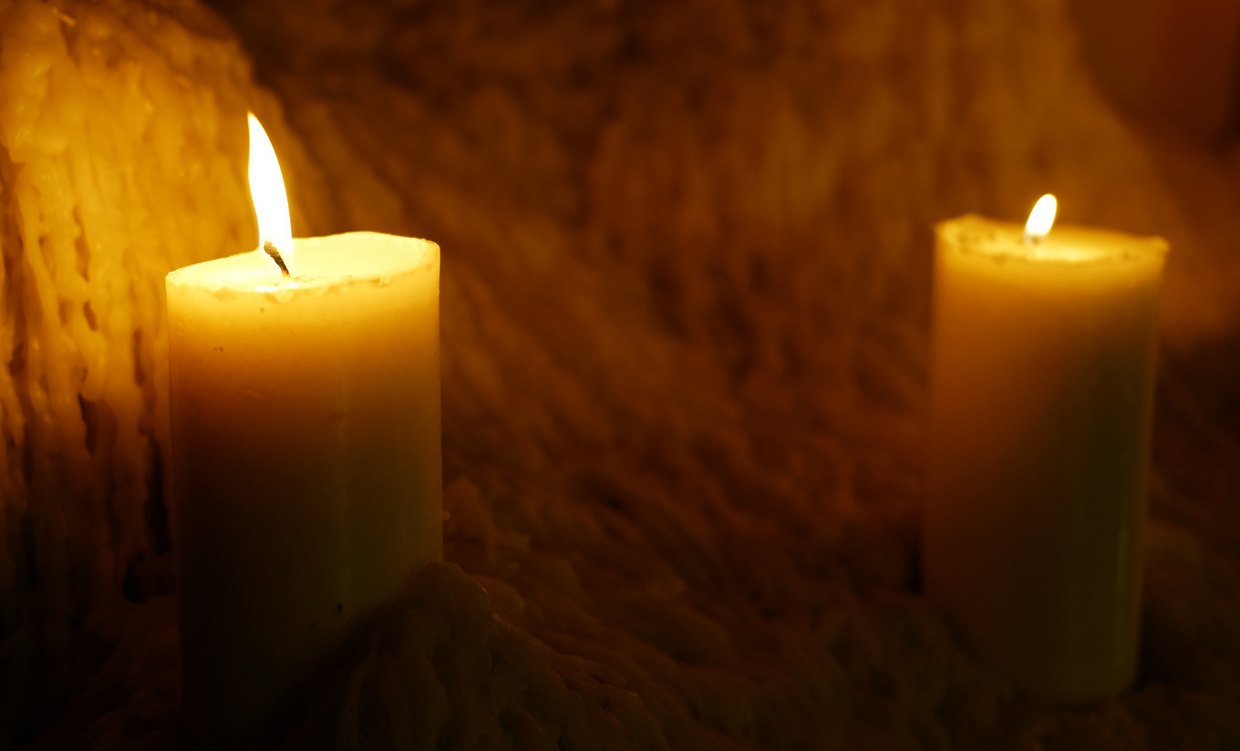 two burning candles, an Abstract Photo by AlexZaitsev