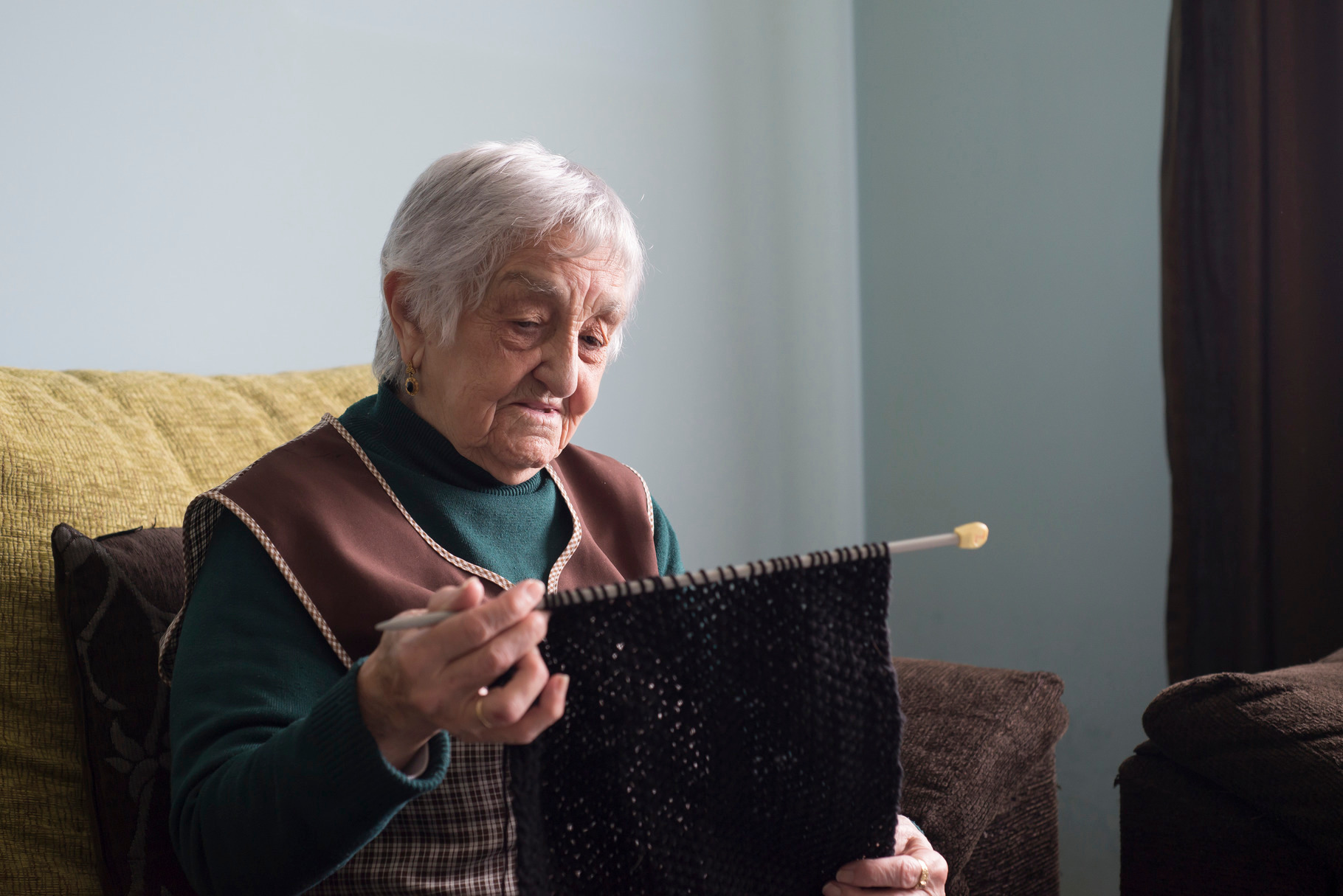 Elderly woman knitting at home featuring knitting, woman, and elderly ...