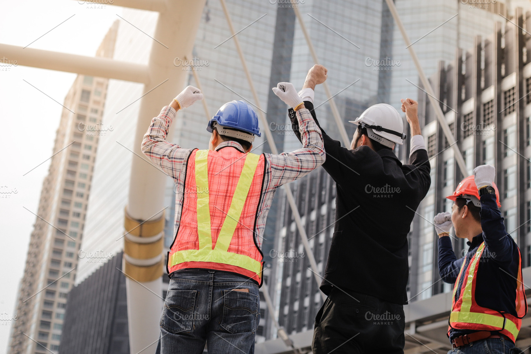 Happy team of construction workers, a Business Photo by Nuchylee Photo ...