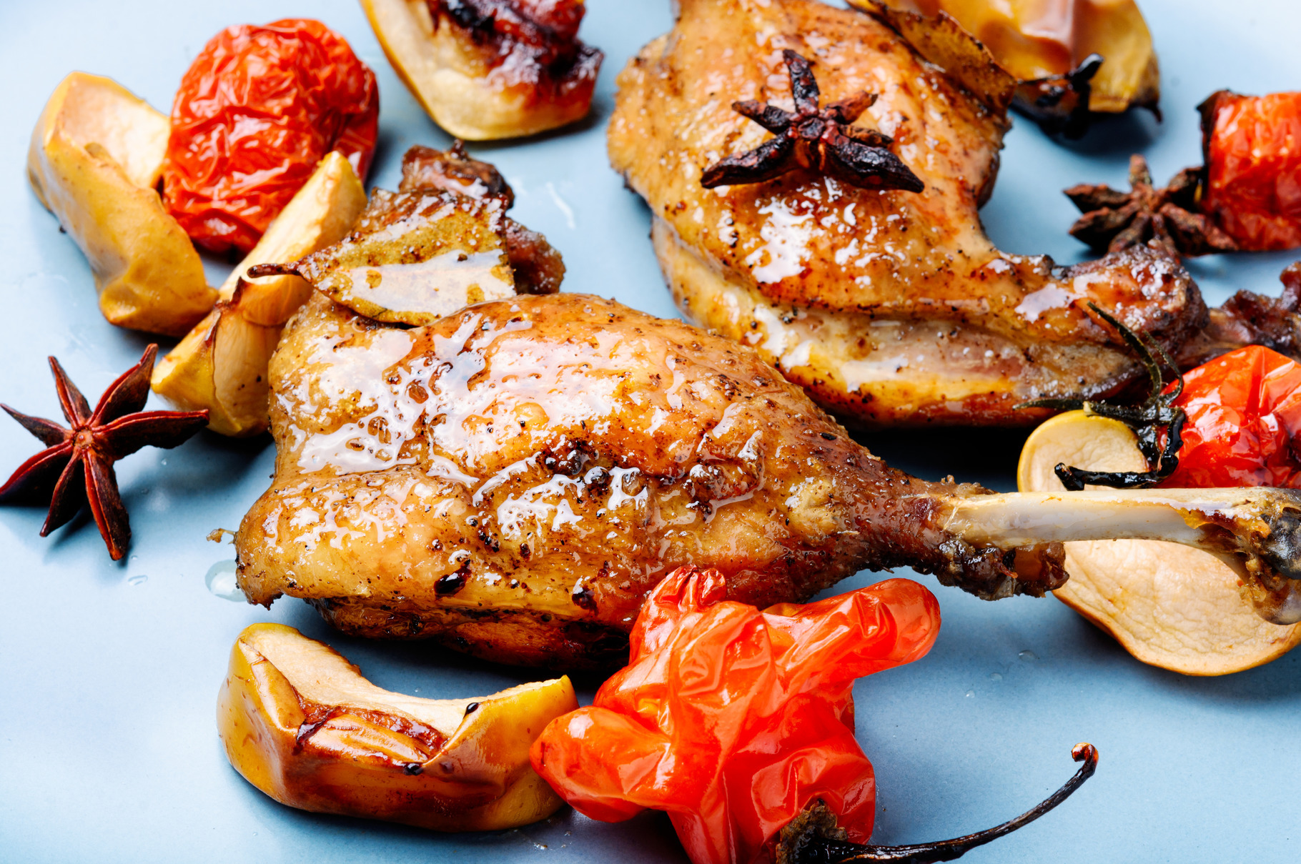 Duck legs with vegetable garnish featuring duck, food, and dinner, a ...