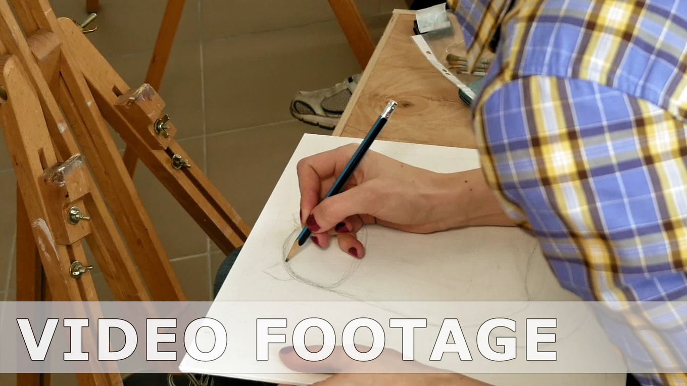 Female artist draws a pencil sketch in art studio, a Graphic by HighRes ...