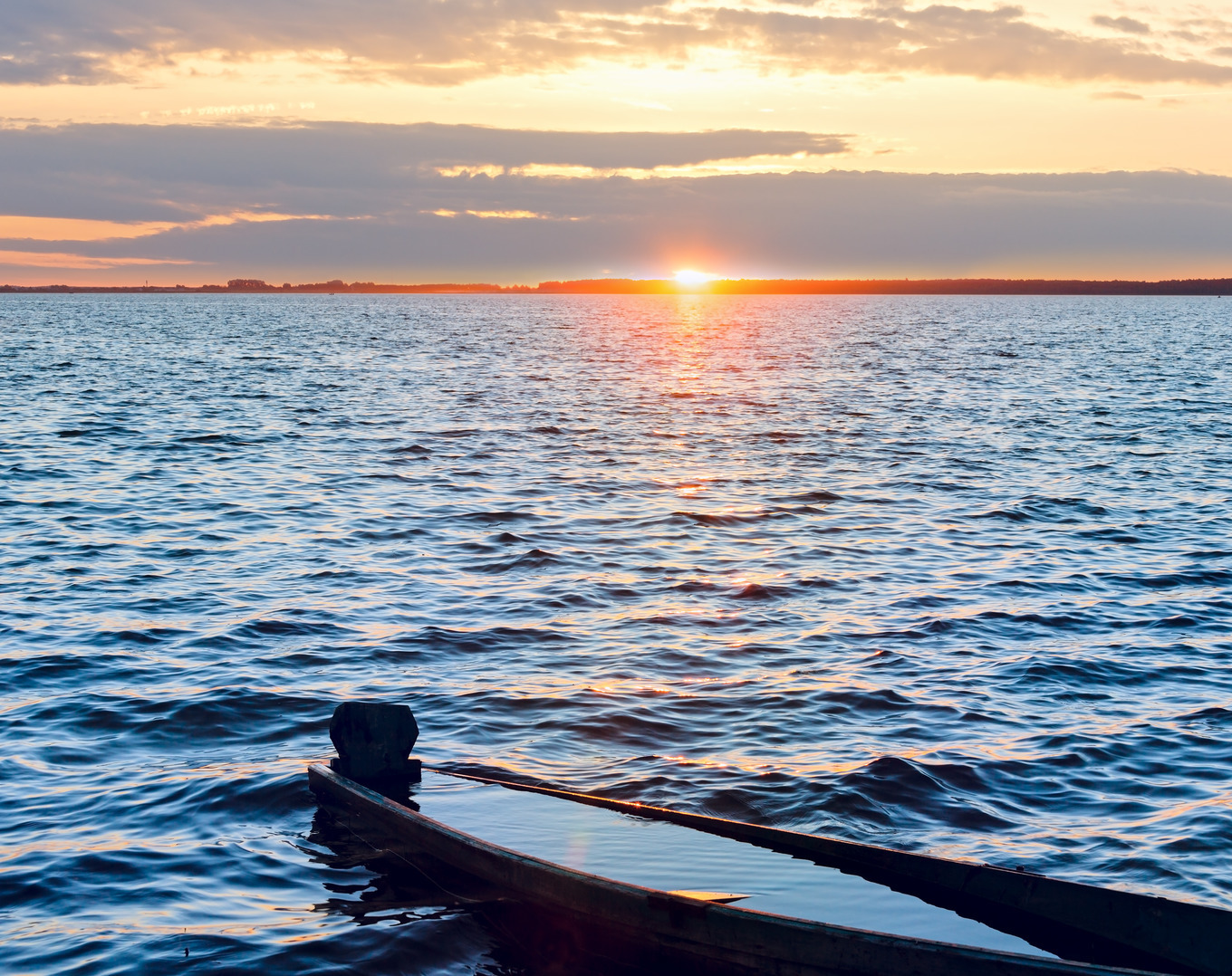 Sunset and lake featuring boat, cloud, and drowned | Nature Stock ...