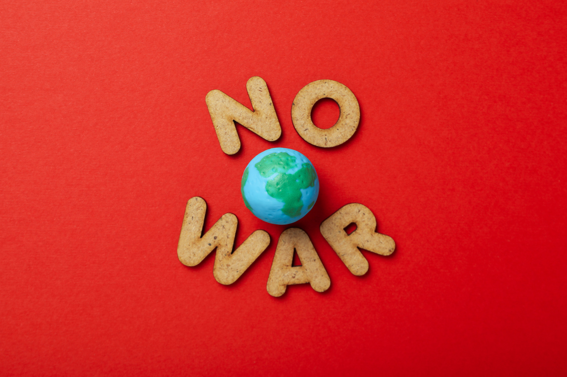 Concept of No War on red background, an Arts & Entertainment Photo by ...