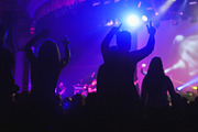 The crowd of shadows of people dancing at the concert | People Images ...