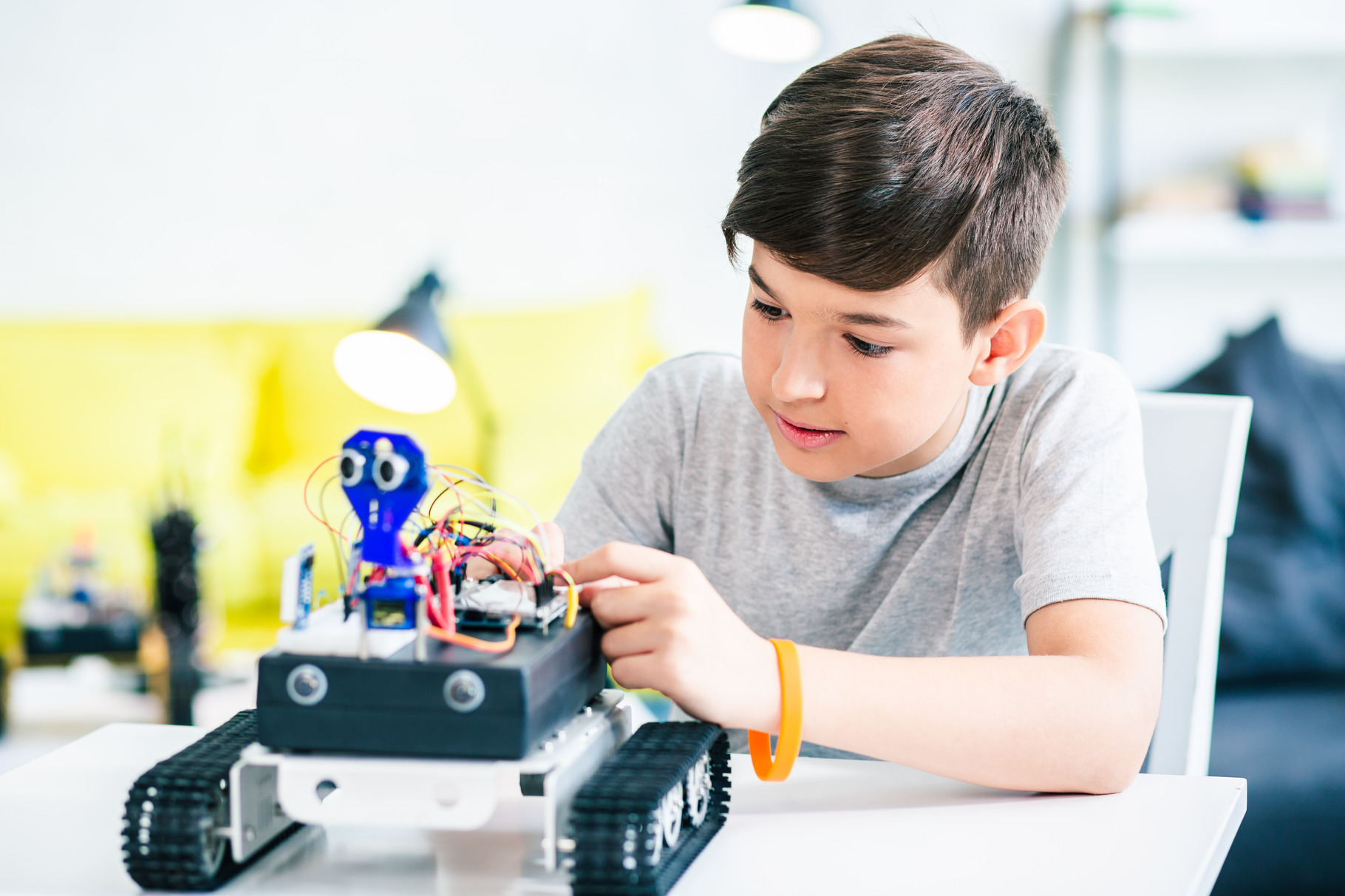 Smart schoolboy being involved in en | Technology Stock Photos ...