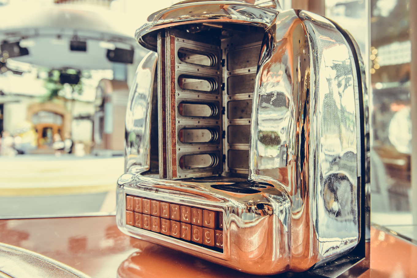 Old jukebox music player, a Technology Photo by Casanowe-studio