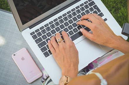 Man using his macbook pro featuring macbook, laptop, and office, a ...