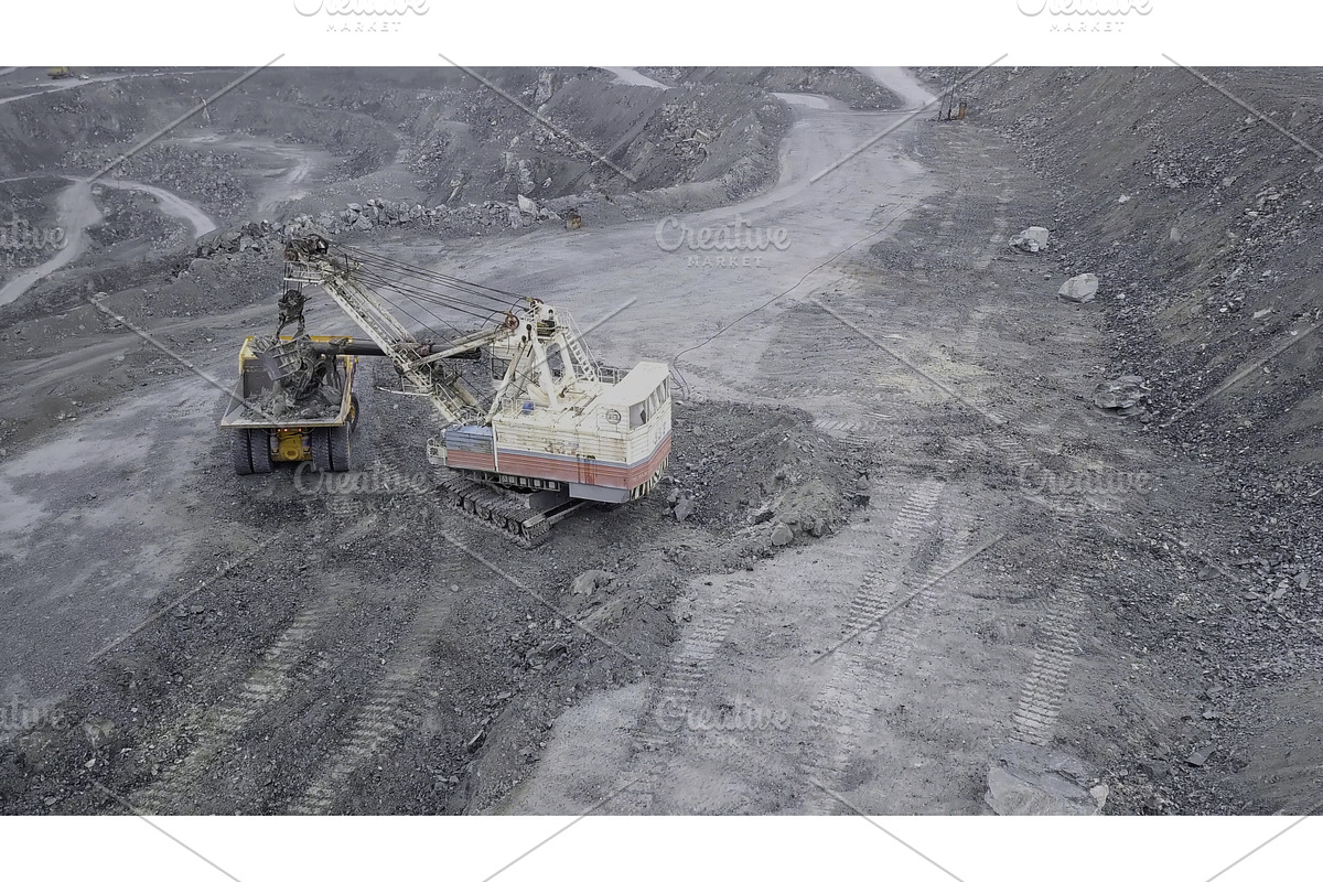 Top view of excavator in open pit, a Background Graphic by Media Whale ...