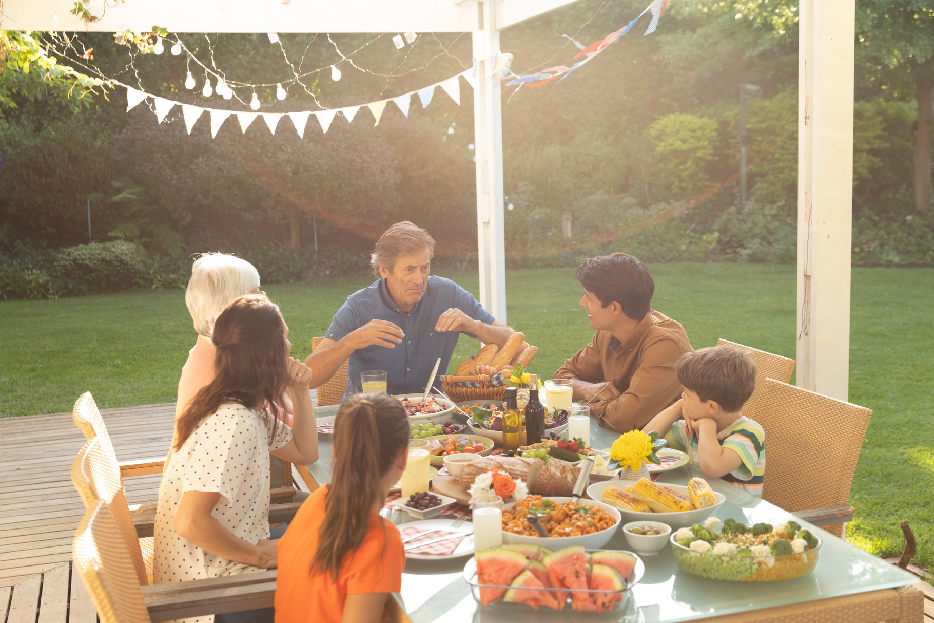 Family eating outside together | Stock Photos ~ Creative Market