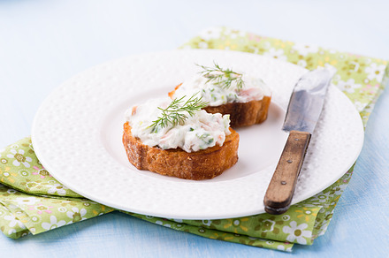 Canape with soft cheese spread featuring salmon, soft cheese, and ...
