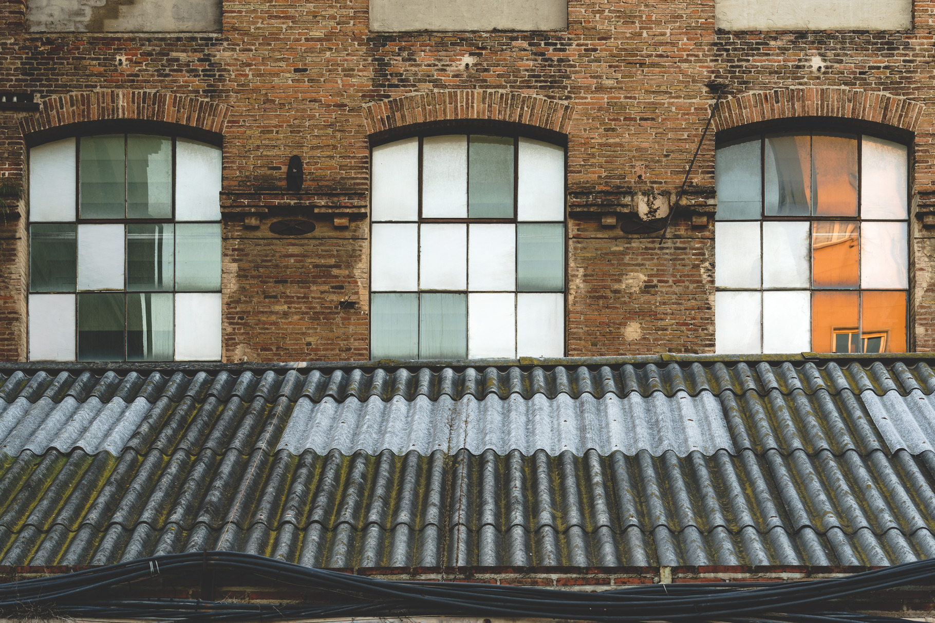 Windows of an old factory, an Industrial Photo by Visual Motiv