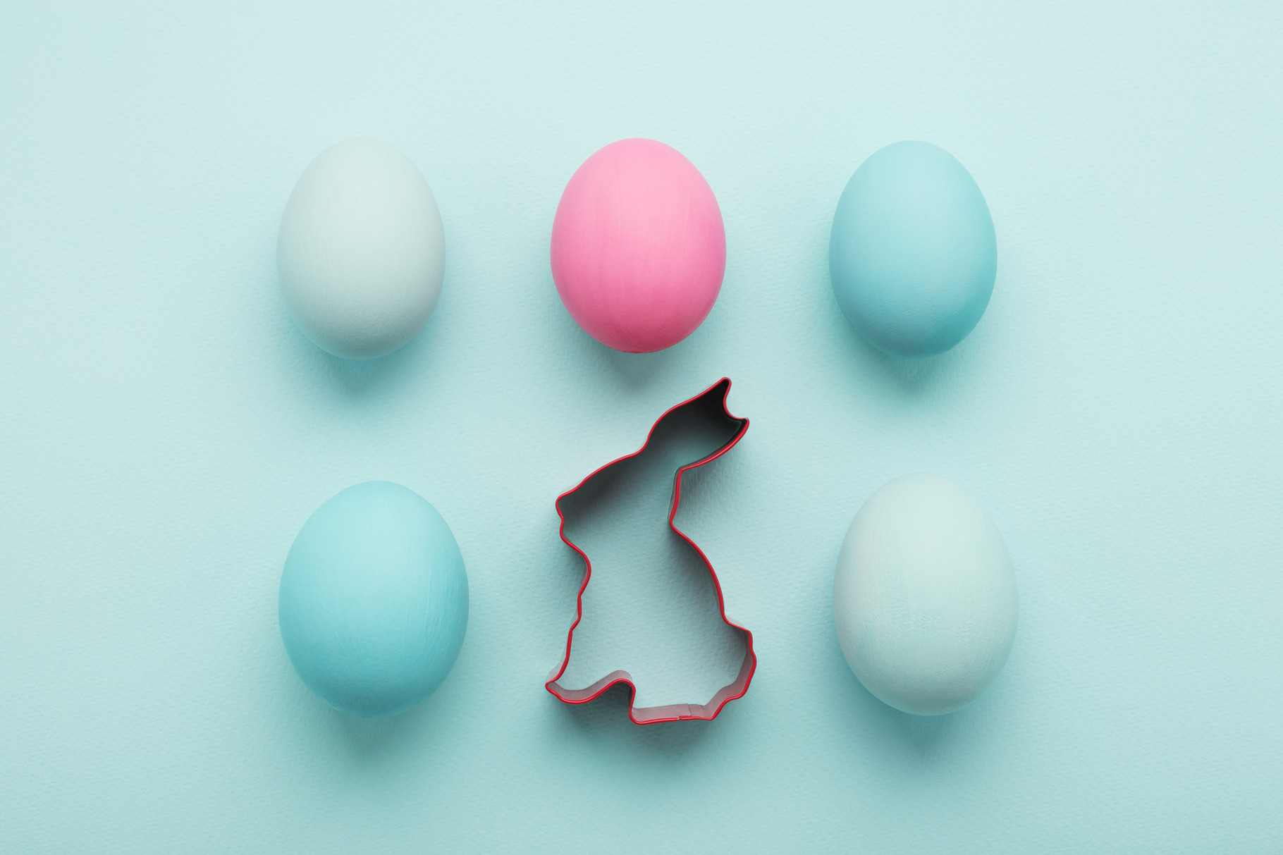 Minimal Easter eggs & bunny on blue, a Holiday Photo by OlliUlli